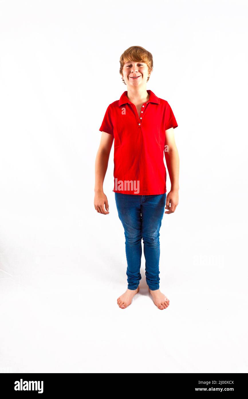 portrait of smiling standing boy in studio Stock Photo - Alamy