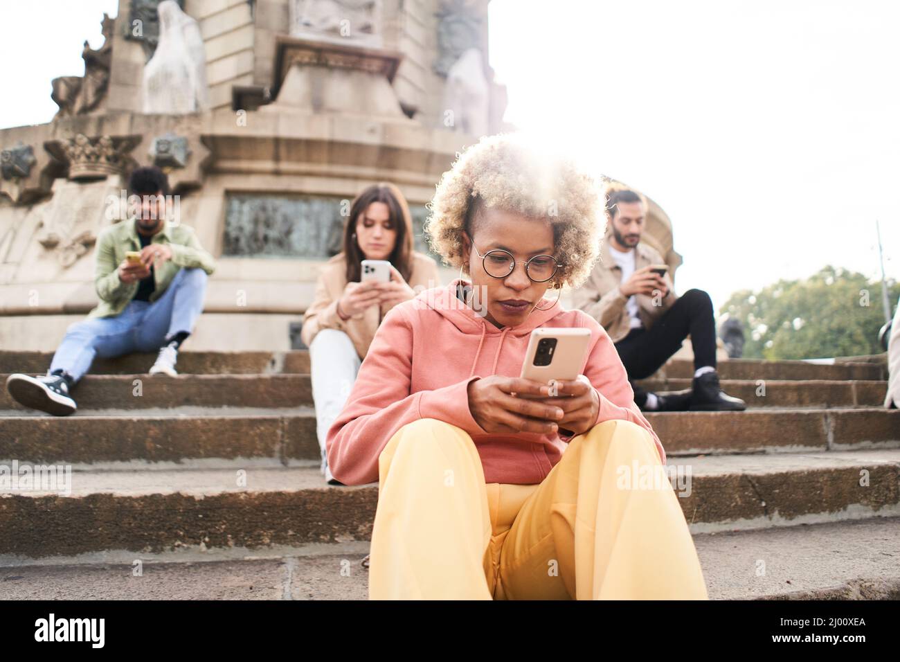 Group of people using phone with serious face and ignoring each other ...