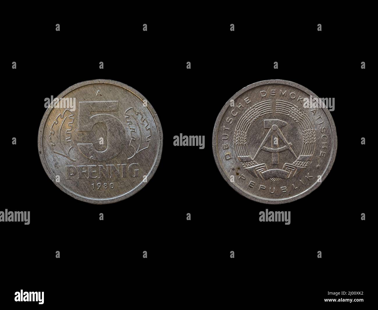 Top view of the front and back of a historic East Germany pfennig coin ...