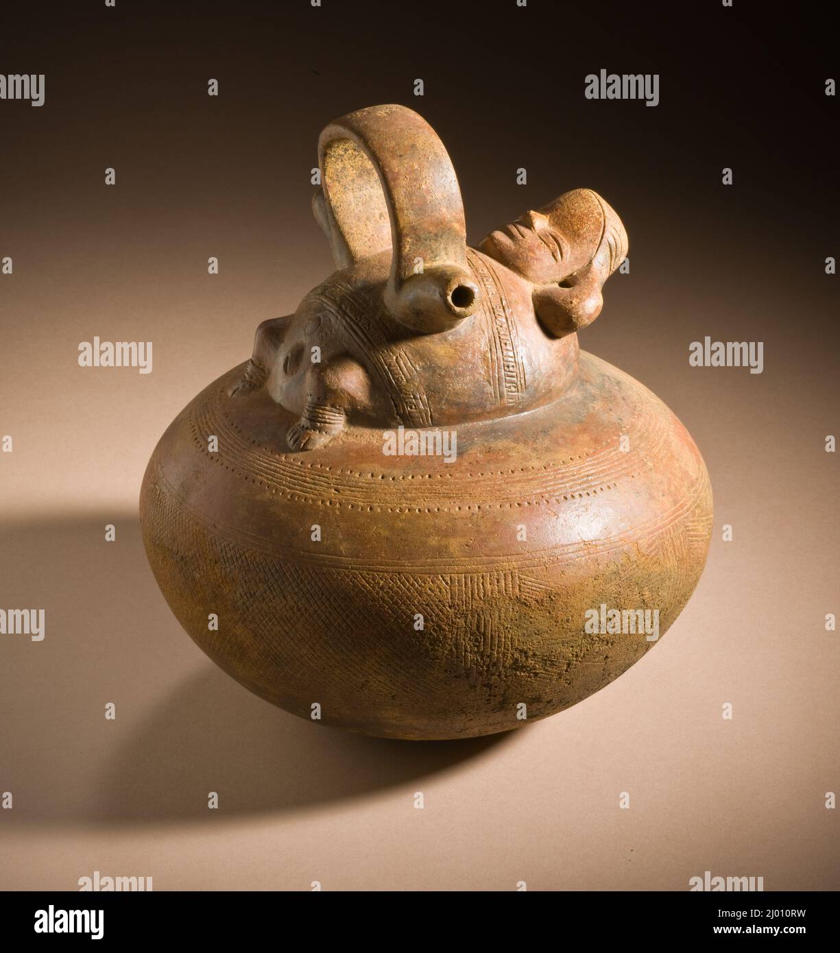 Double Spout and Bridge Vessel with Reclining Female Figure. Colombia ...