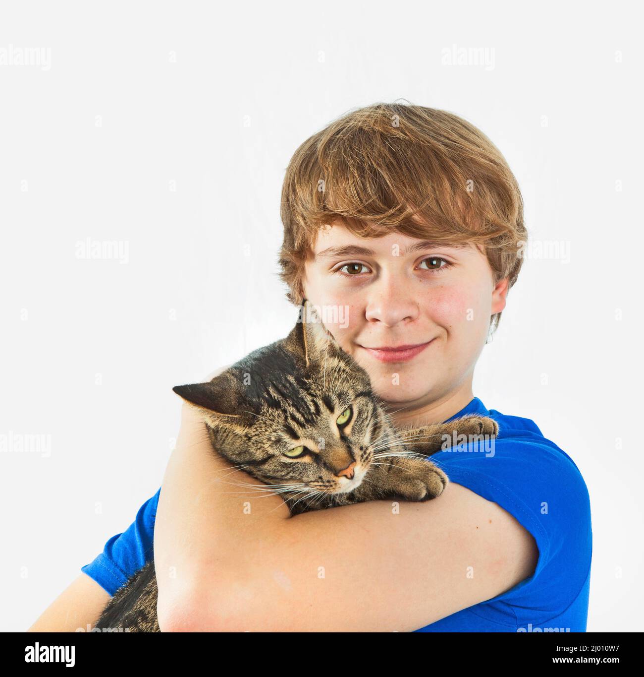 portrait of handsome teenage boy with his cat Stock Photo - Alamy
