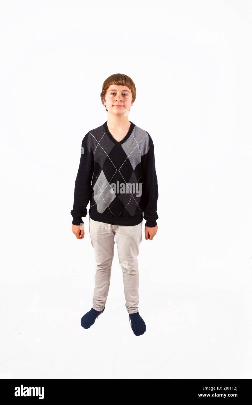 smart happy young boy posing in studio Stock Photo - Alamy