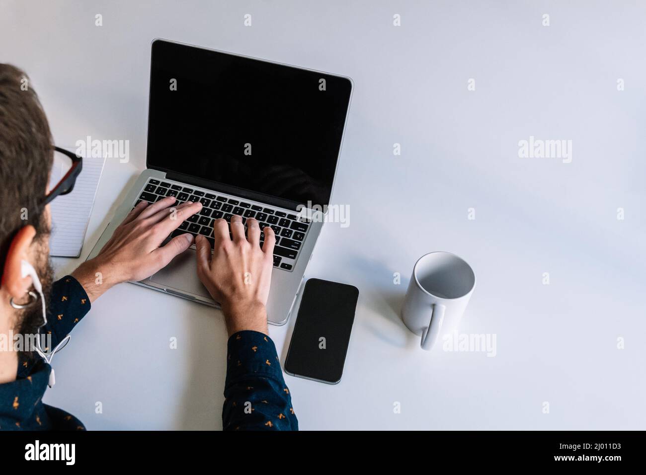 Working at home with laptop Stock Photo - Alamy