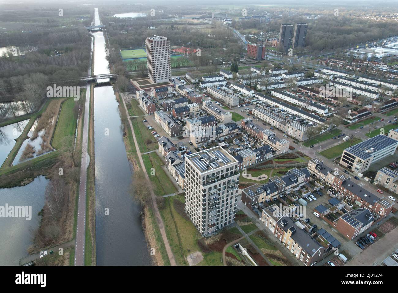Aerial view of Tilburg city and a lake flowing by the buildings in the ...
