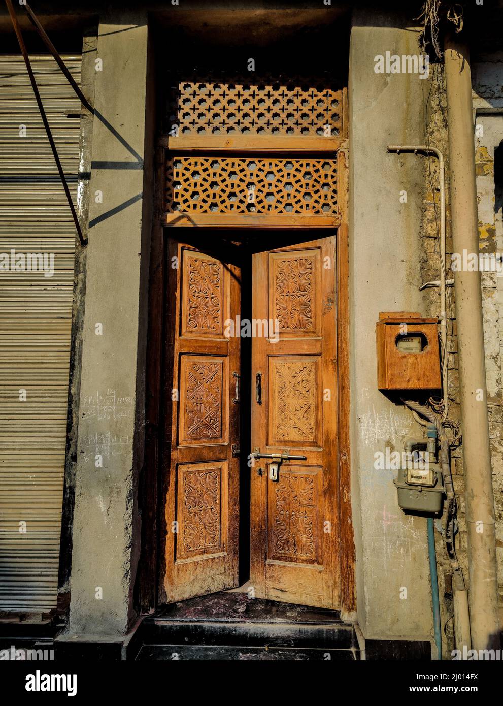 The open door of a house in Sethi Mohallah of Peshawar in Pakistan ...