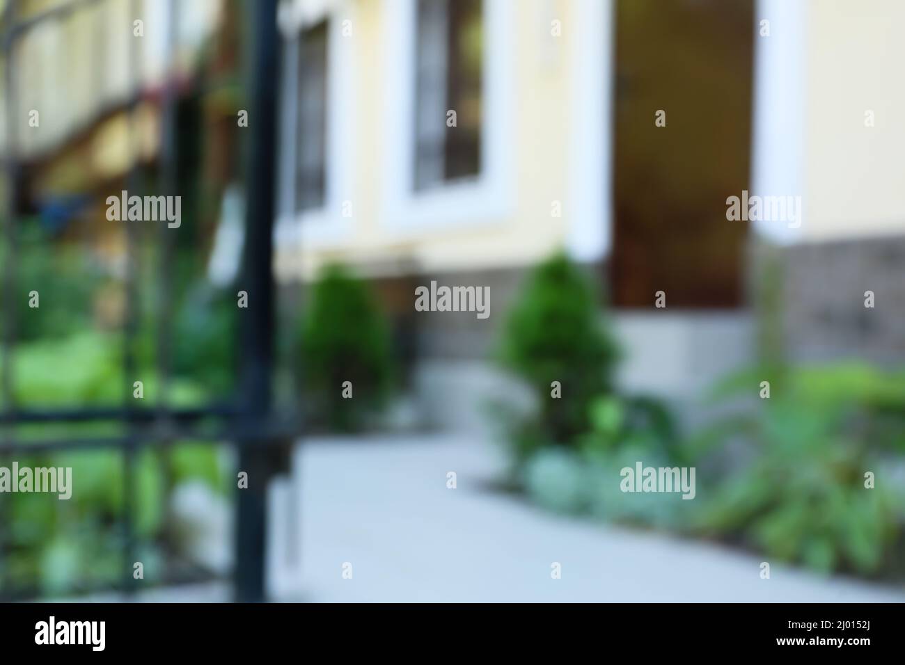 Blurred view of modern building with door, stairs and beautiful ...