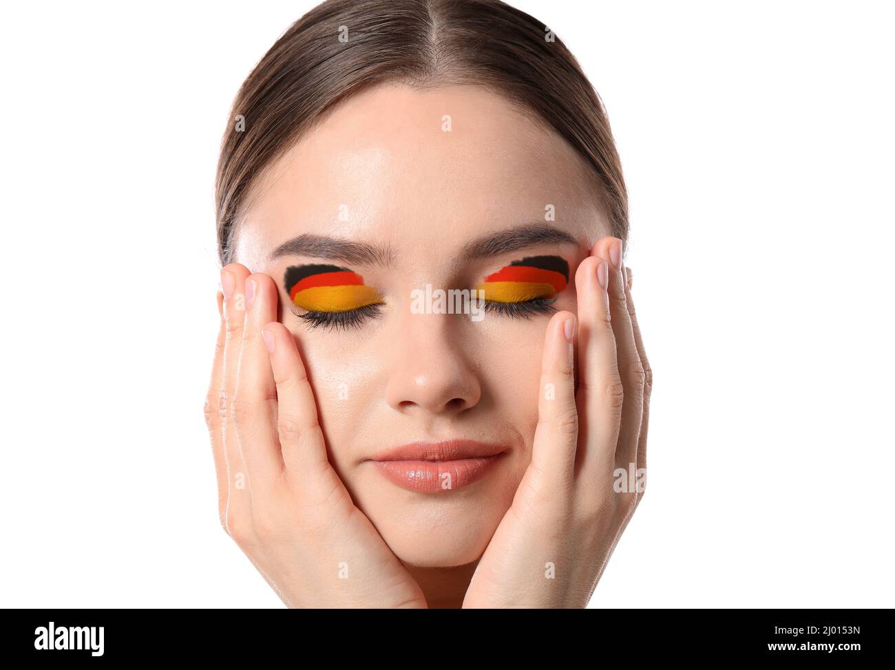 Young woman with creative makeup in colors of German flag on white ...