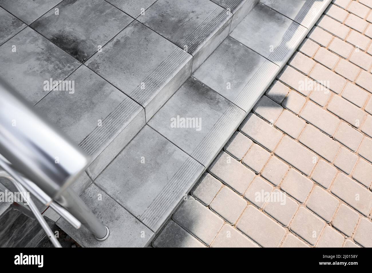 View of granite steps and pavement outdoors Stock Photo - Alamy