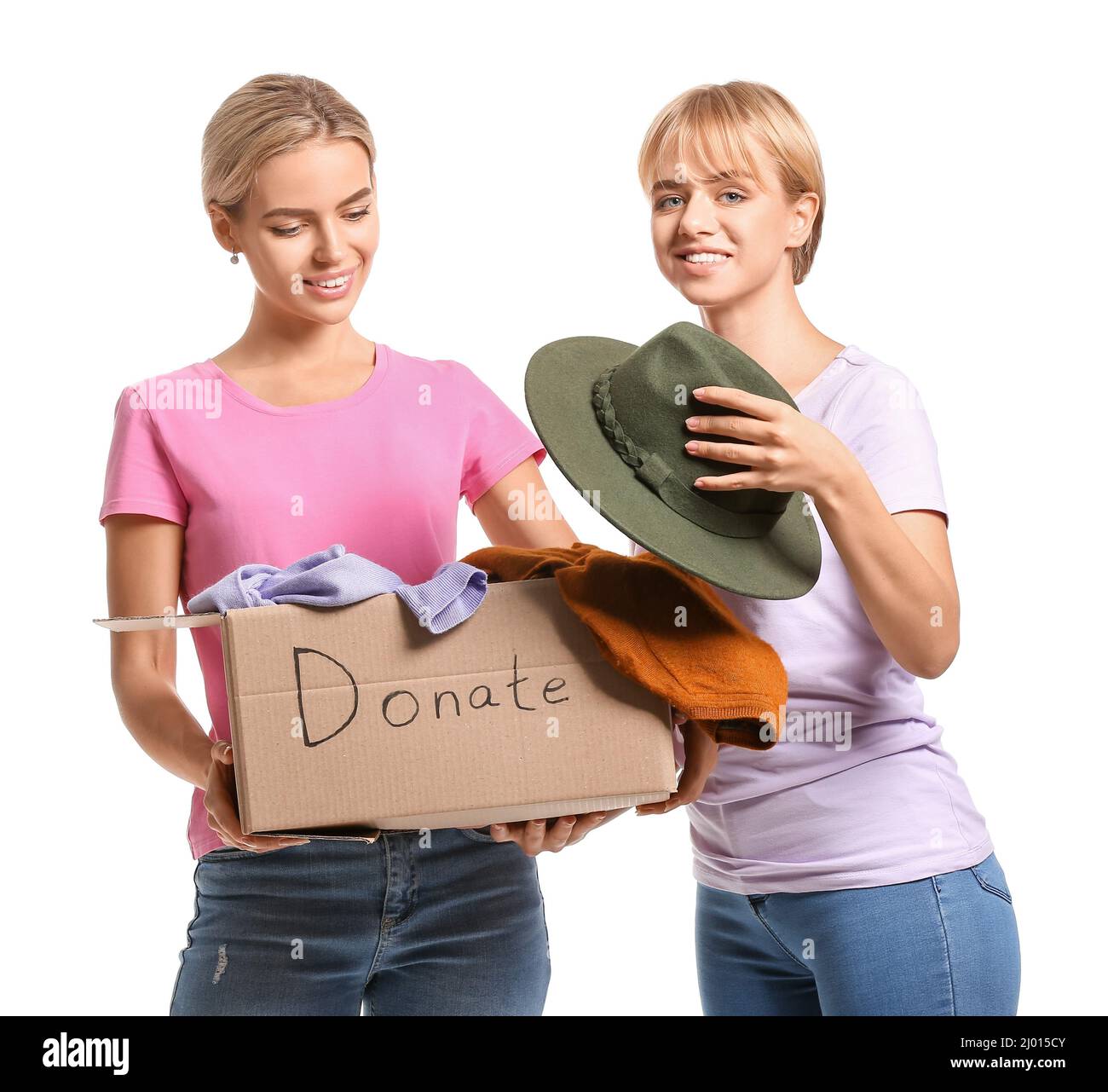 Young women holding box with donations on white background Stock Photo ...
