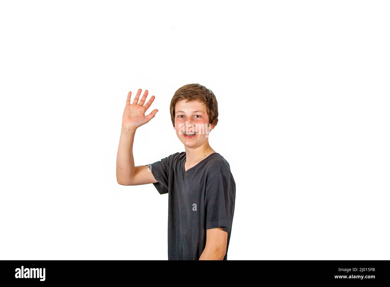 happy joyful boy gives sign Stock Photo - Alamy