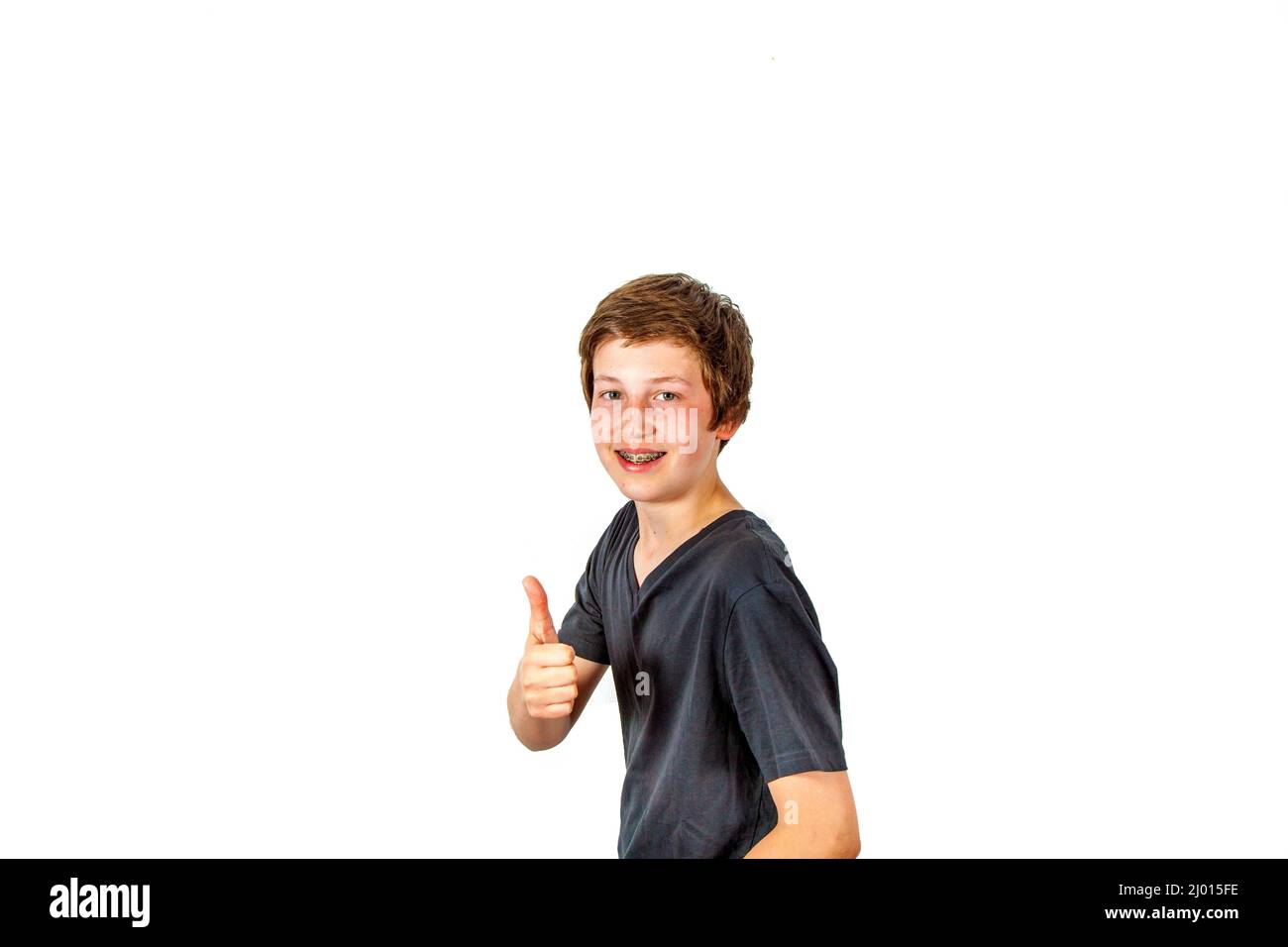 happy joyful boy gives sign Stock Photo - Alamy