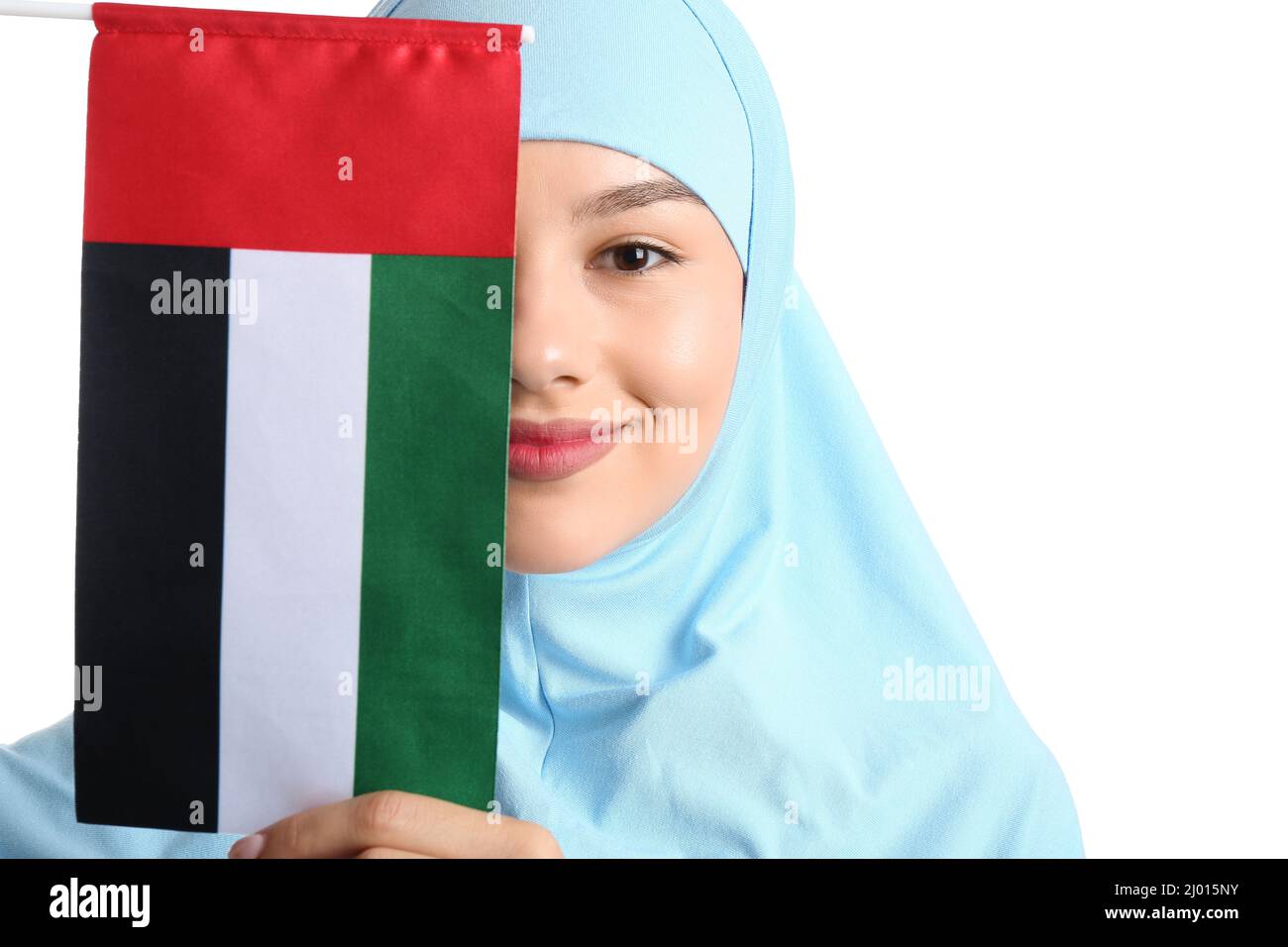 Beautiful Muslim woman with UAE flag on white background Stock Photo ...