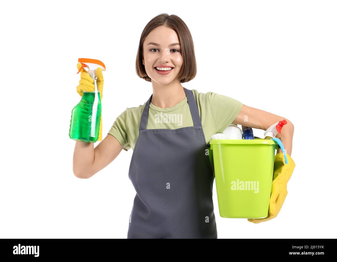 Beautiful young woman with cleaning supplies on white background Stock ...
