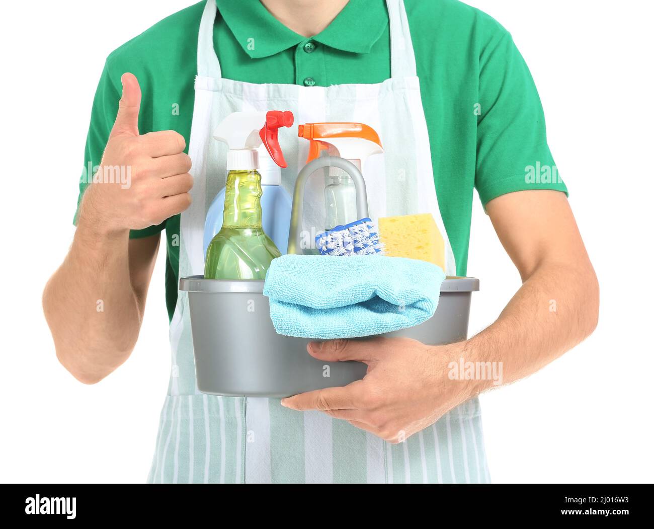 Young worker of cleaning service with supplies showing thumb-up on ...