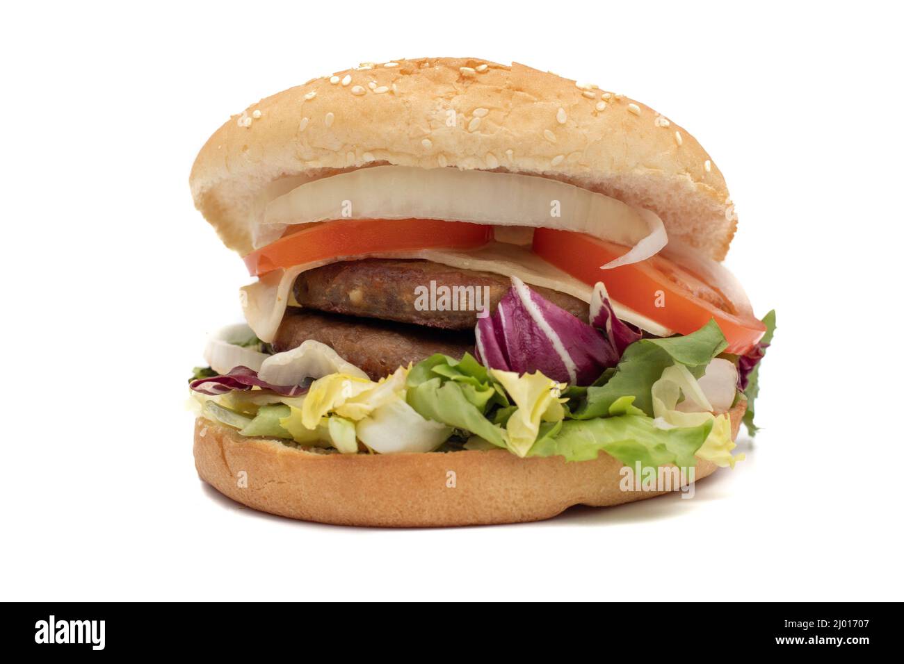 A double meat burger, with the ingredients, lettuce, cabbage, cucumber ...