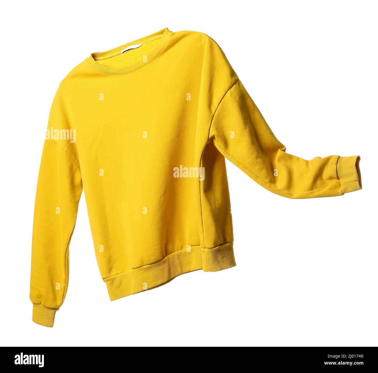 Flying yellow sweatshirt on white background Stock Photo - Alamy