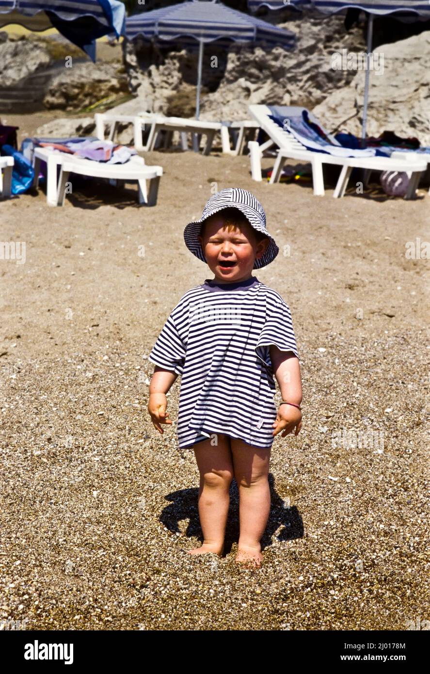 Infant crying beach hi-res stock photography and images - Alamy