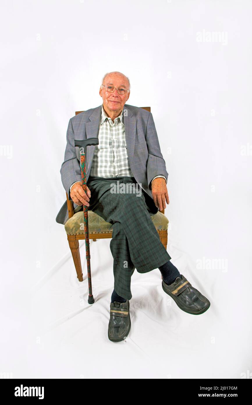 Old friendly man in glasses hi-res stock photography and images - Alamy