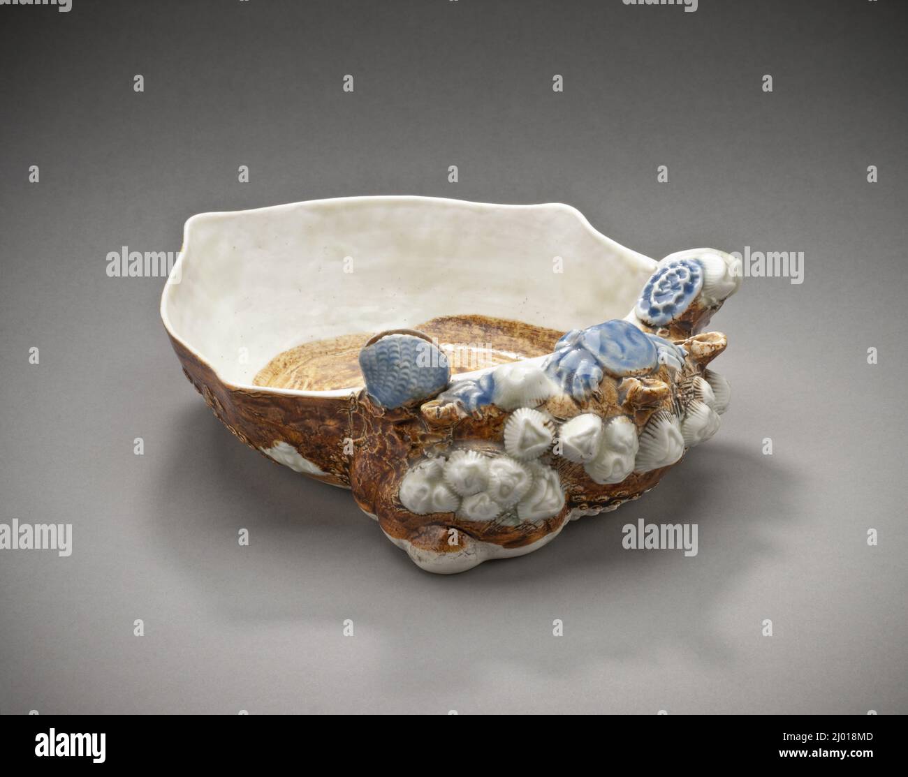 Porcelain with white brown and blue glazes hi-res stock photography and ...