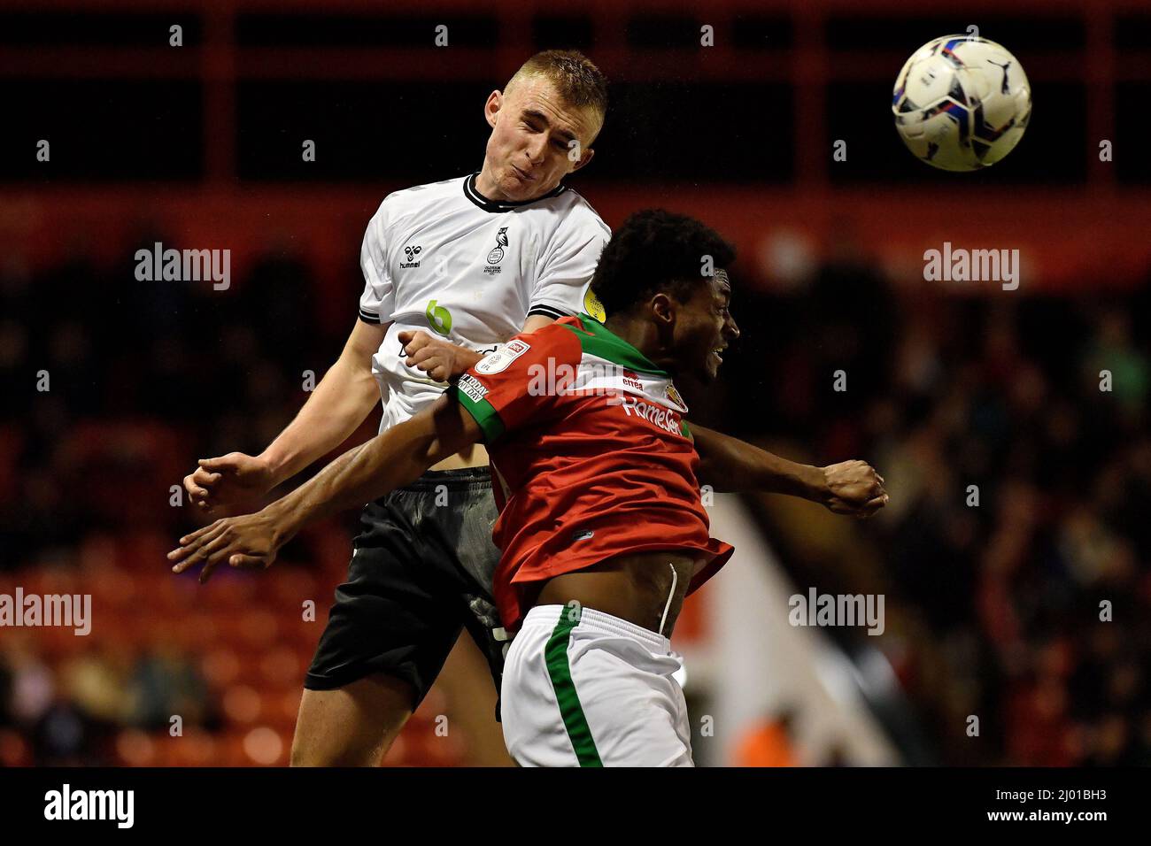 WALSALL, UK. MAR 15TH Oldham Athletic's Will Sutton tussles with Tyrese ...