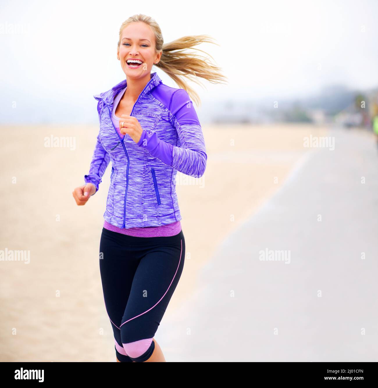 Fit blonde woman running near hi-res stock photography and images - Alamy