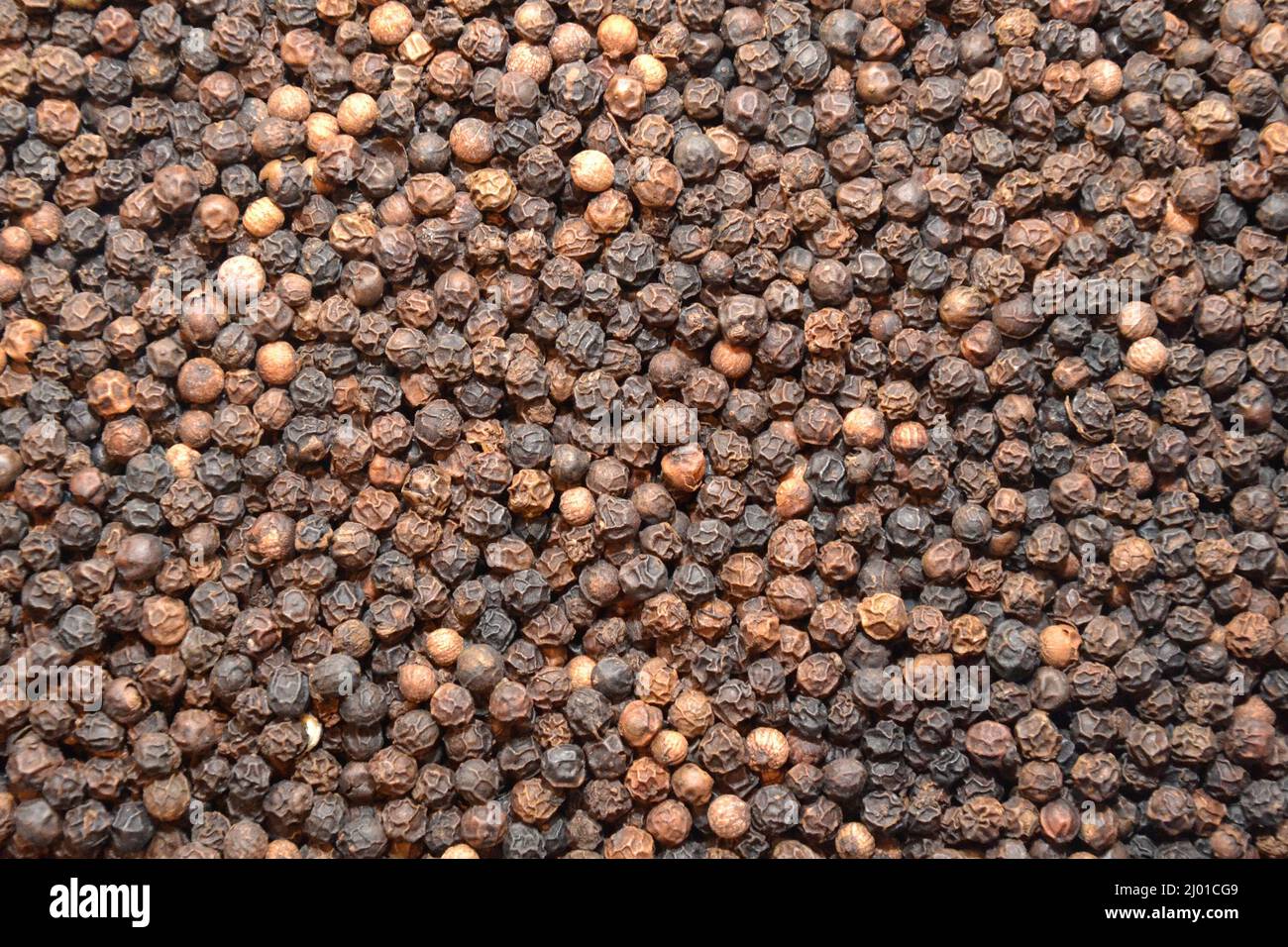 Black pepper grains hi-res stock photography and images - Alamy