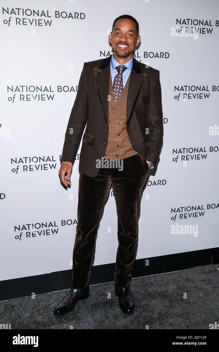 Will Smith walking on the red carpet during the National Board of ...