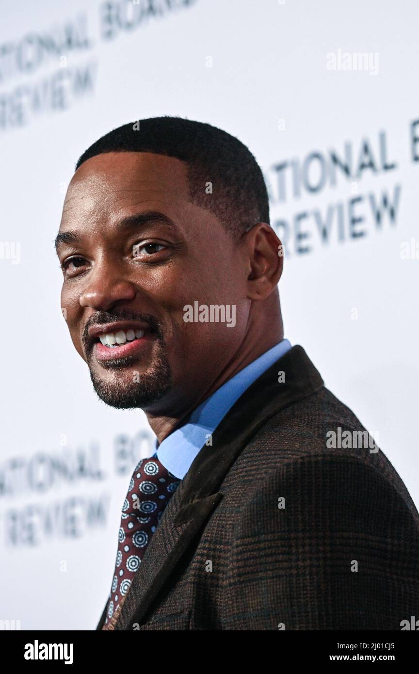 Will Smith walking on the red carpet during the National Board of ...