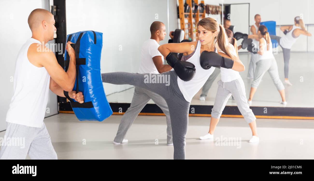 Practicing kickboxing young woman hi-res stock photography and images ...