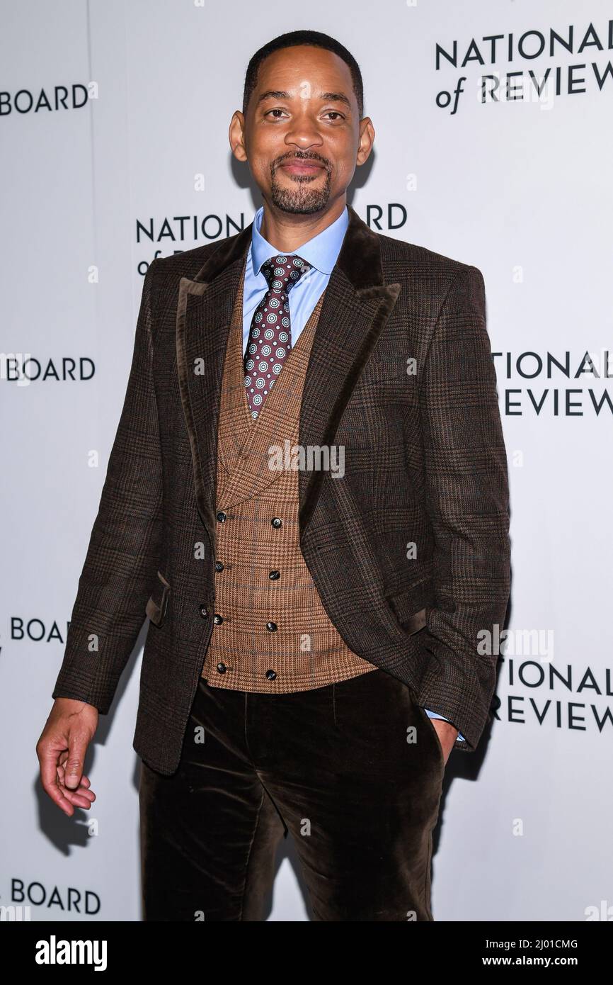 Will Smith walking on the red carpet during the National Board of ...