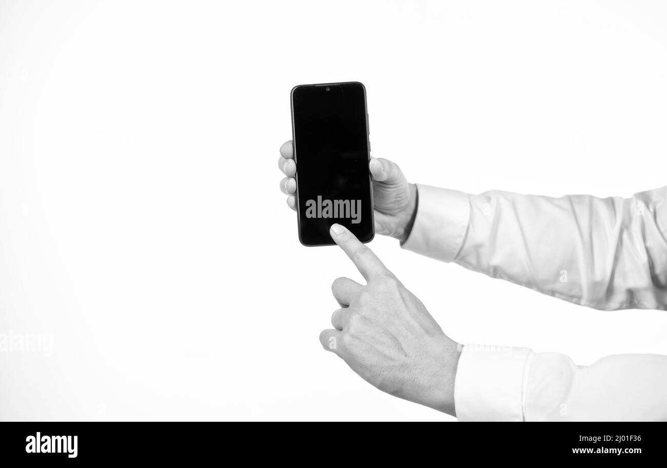 hand of man presenting phone screen. pointing finger on smartphone ...