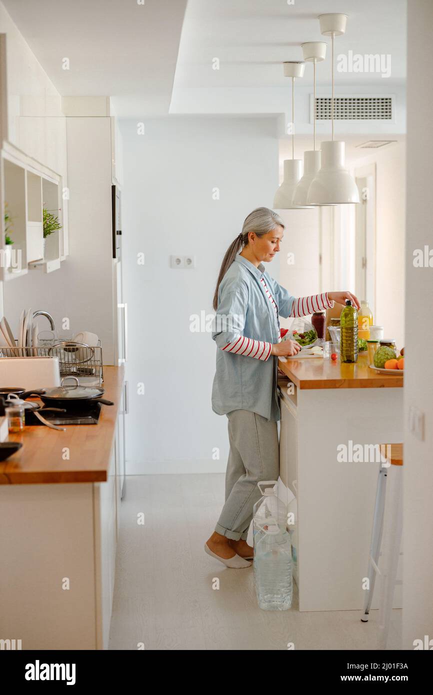 At home eat woman hi-res stock photography and images - Alamy