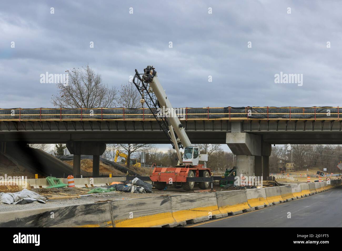Repair site on the under renovation bridge with road under construction ...