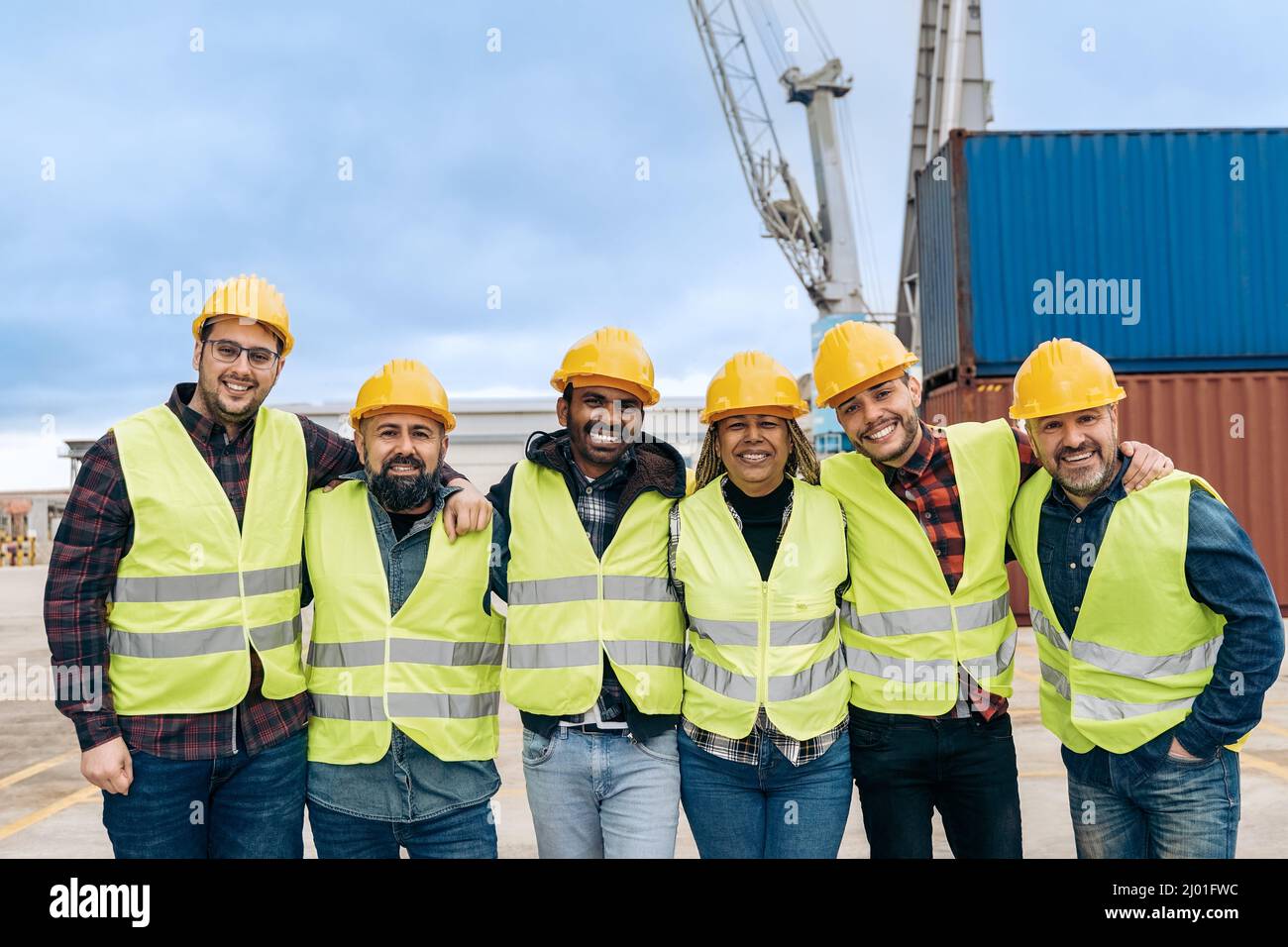 Multiracial worker people having fun inside container cargo terminal at ...