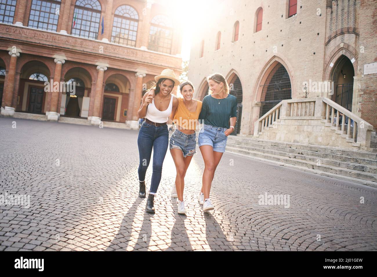 People enjoying summer vacations. Group of women walking laughing at ...
