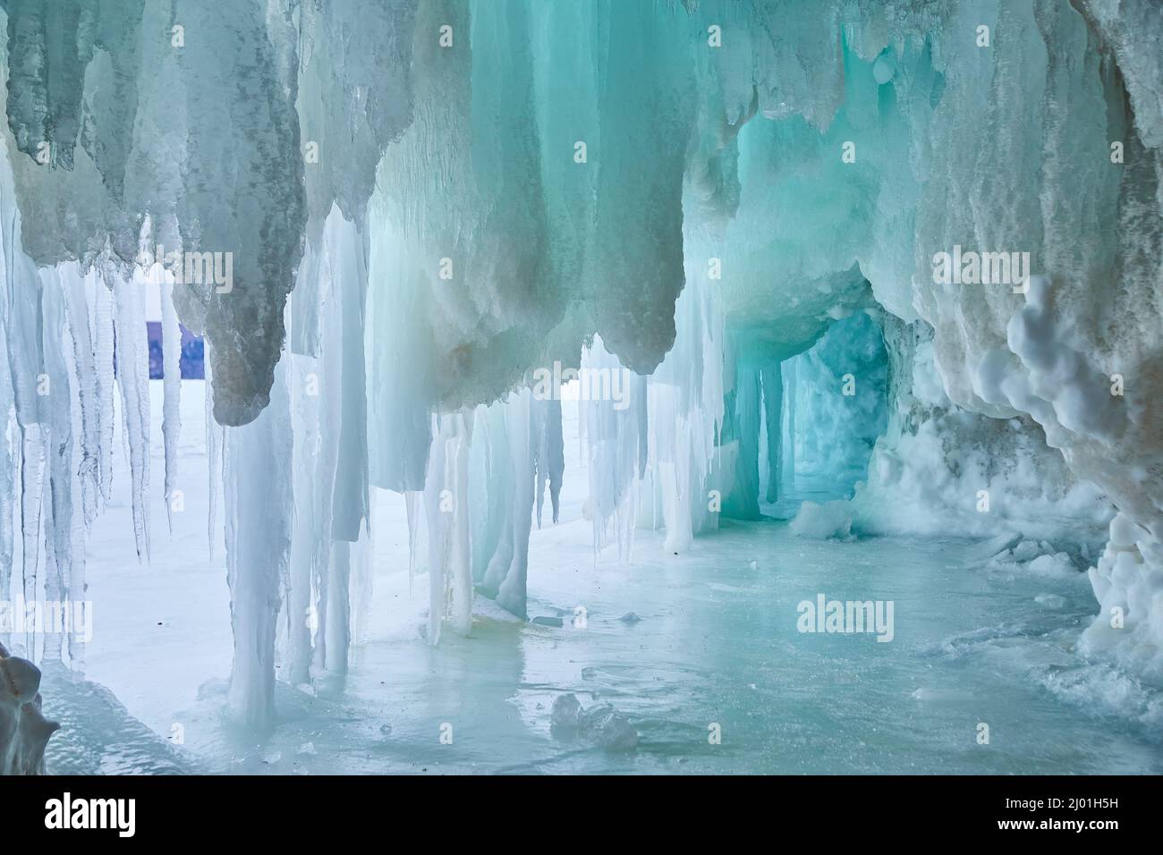 Ice tunnel in winter of blue and green Stock Photo - Alamy