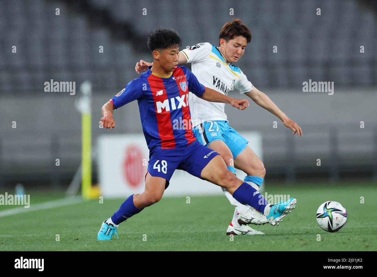 Ajinomoto Stadium, Tokyo, Japan. 15th Mar, 2022. (L to R) Yuta Arai (FC ...