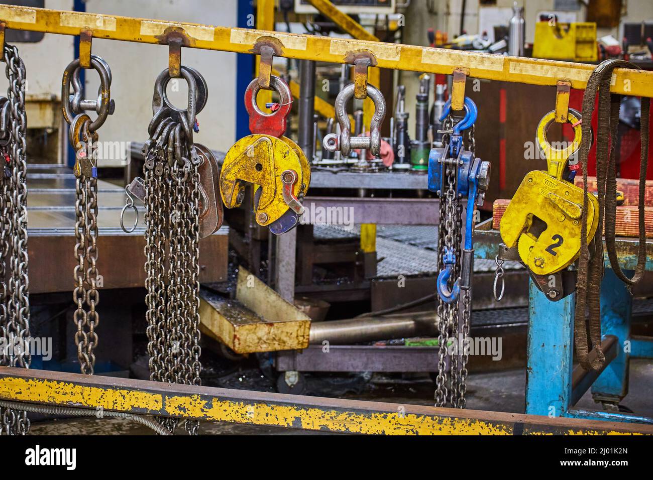 Rack of chains and accessories at factory manufacturing plant Stock ...