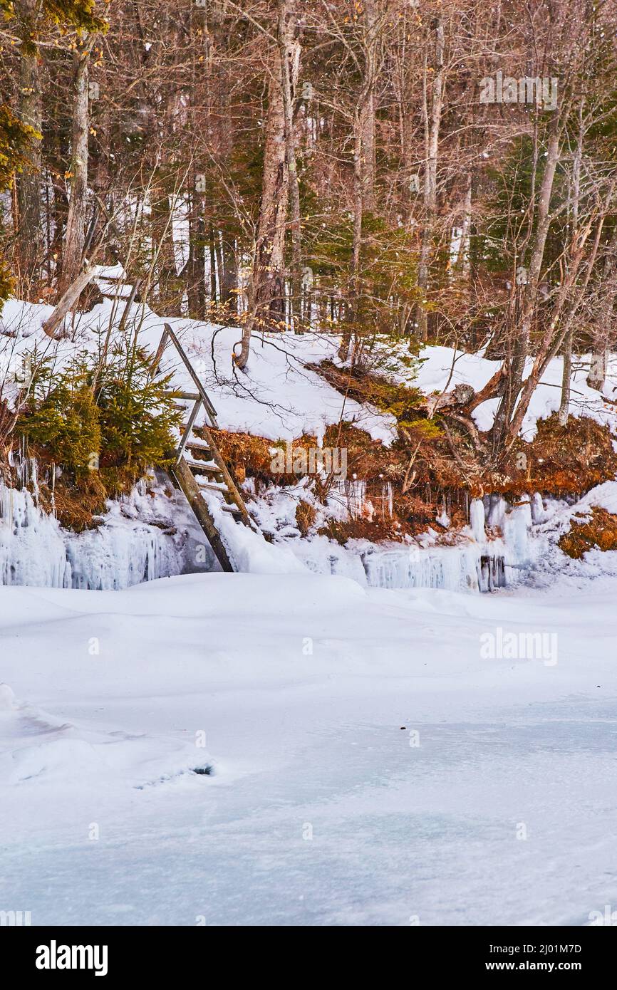 Frozen lake with damaged staircase to water level Stock Photo - Alamy