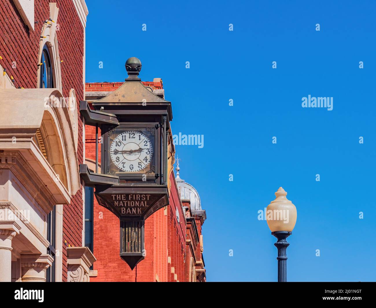 Close up shot of an antique clock in the Guthrie old town at Oklahoma ...