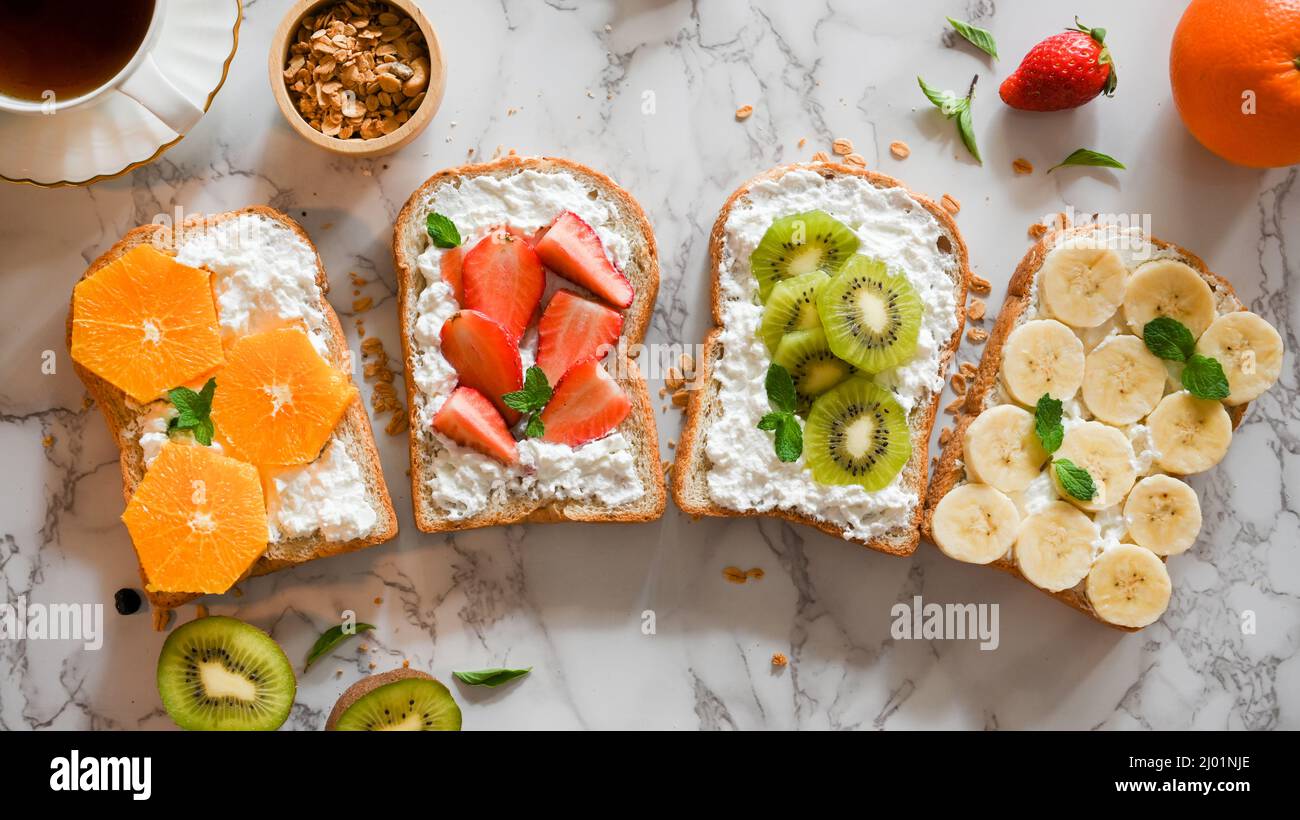 Set of tasty healthy toast with fresh fruits topping and homemade ...