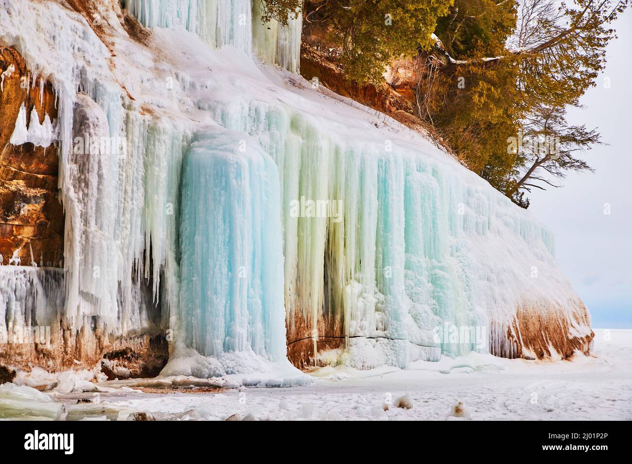 Beautiful frozen waterfalls of blue and green on island in winter Stock ...