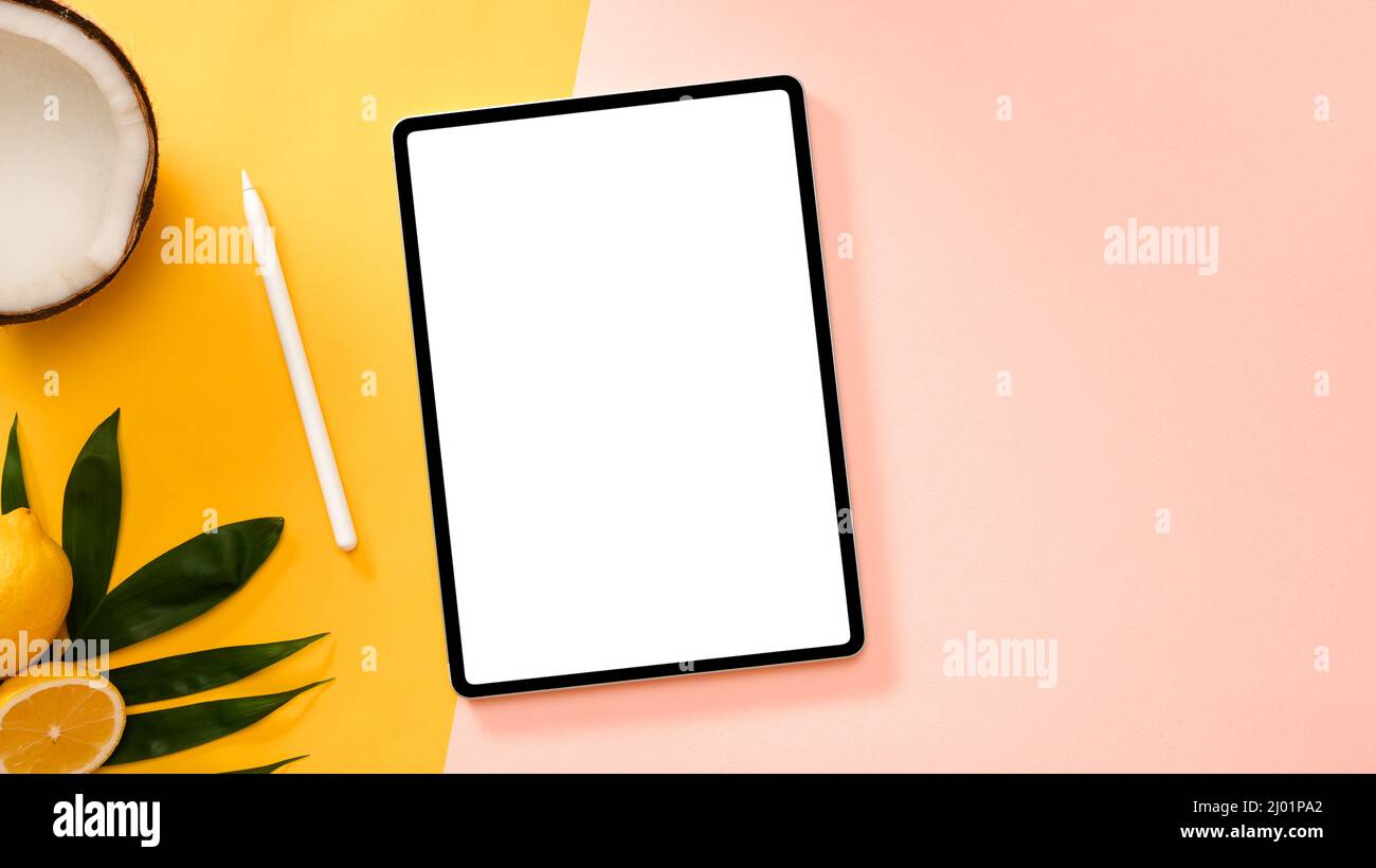 Tablet touchpad white screen mockup on a creative colourful background ...
