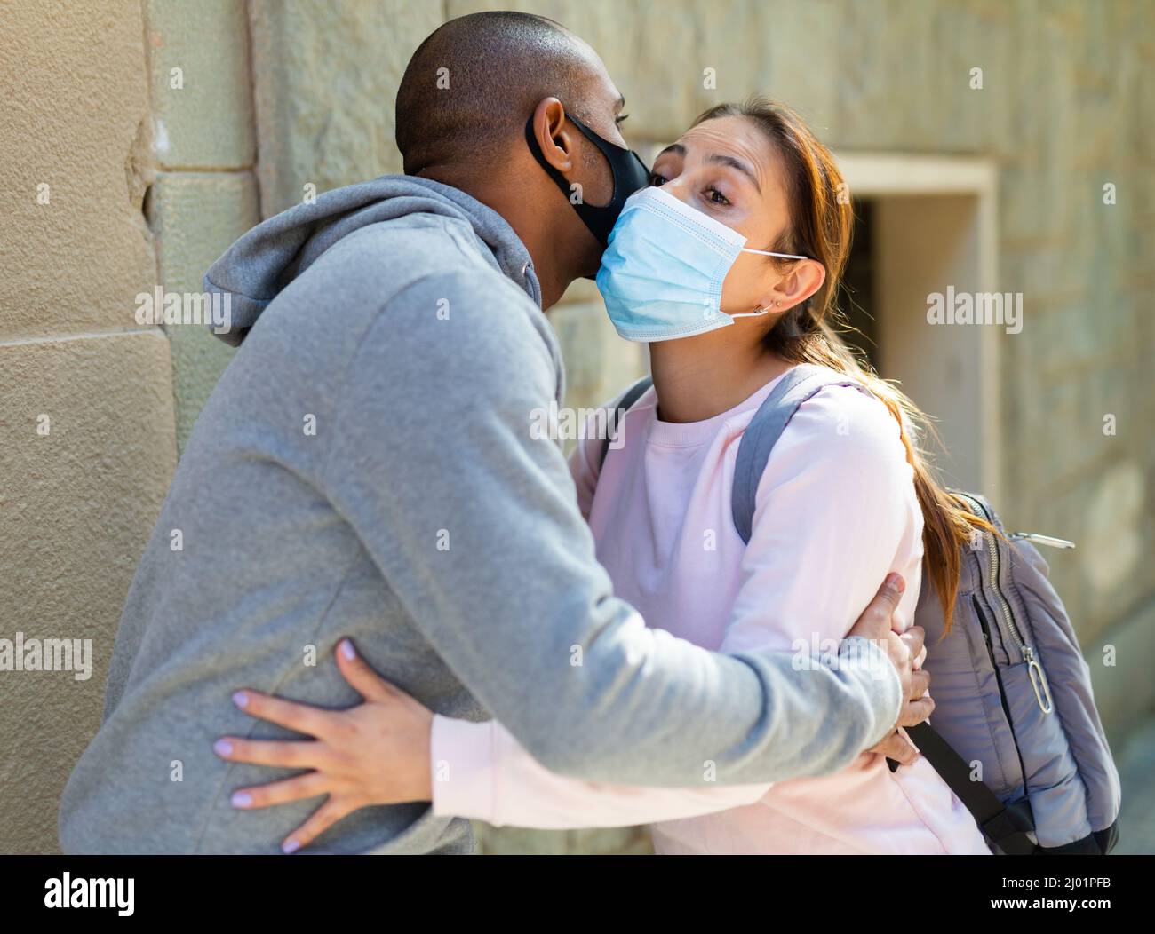 Meeting and kissing on the street hi-res stock photography and images ...