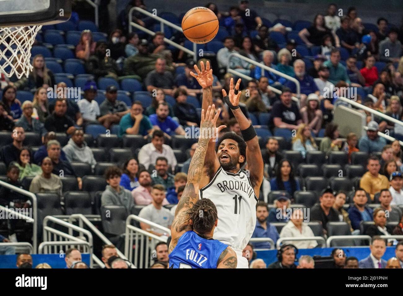 Orlando, Florida, USA, March 15, 2022, Brooklyn Nets Point Guard Kyrie Irving #11 attempt to ...