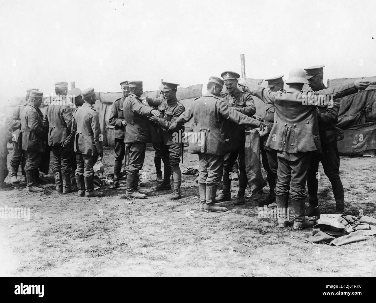 Captured German soldiers being searched after their capture Stock Photo ...
