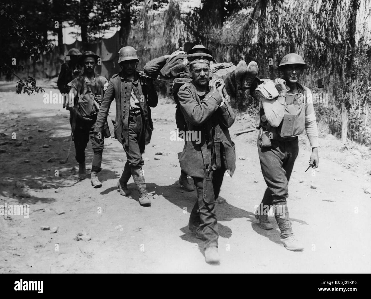 Prisoners carrying soldier hi-res stock photography and images - Alamy