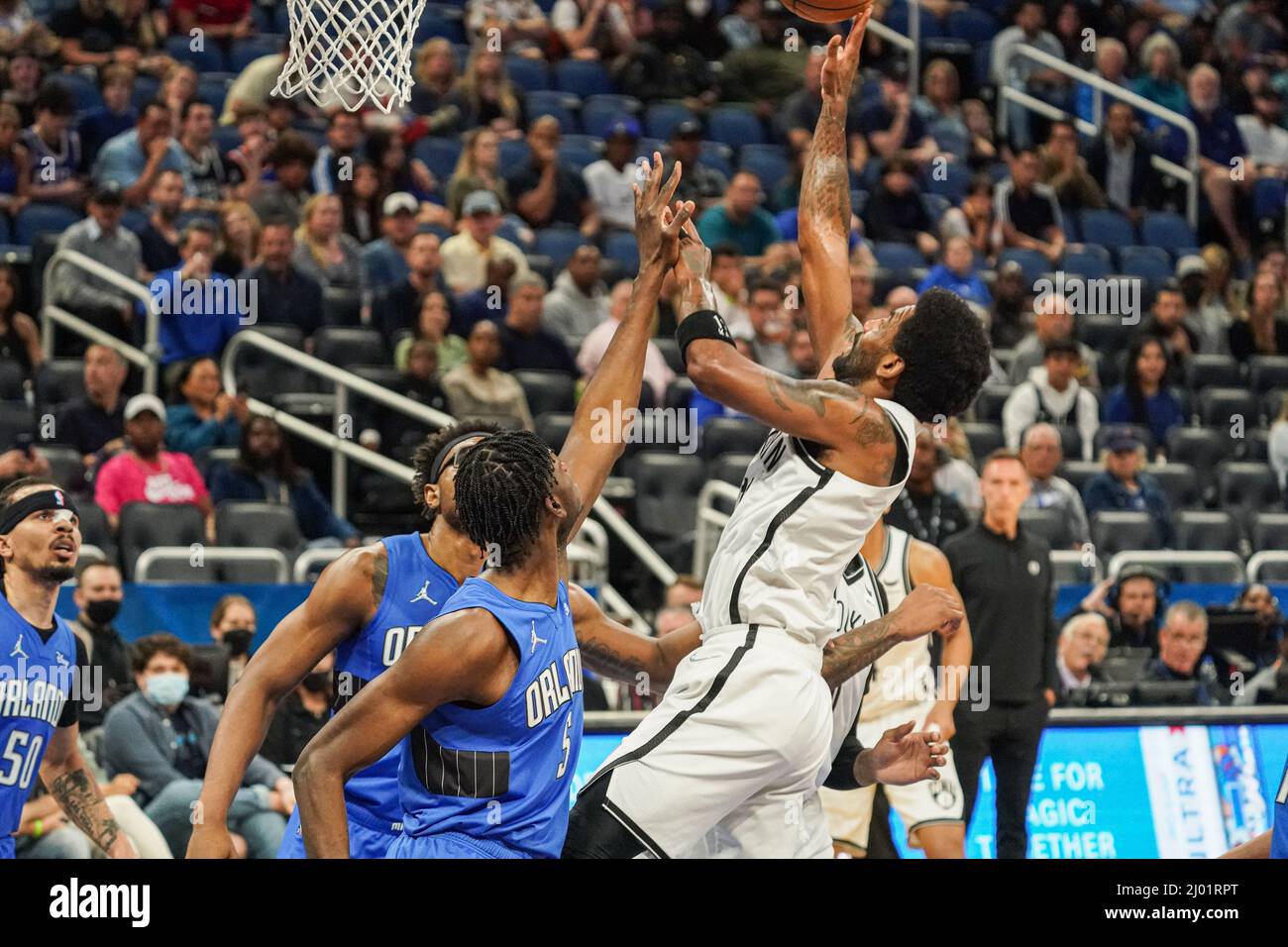 Orlando, Florida, USA, March 15, 2022, Brooklyn Nets Point Guard Kyrie Irving #11 attempt to ...