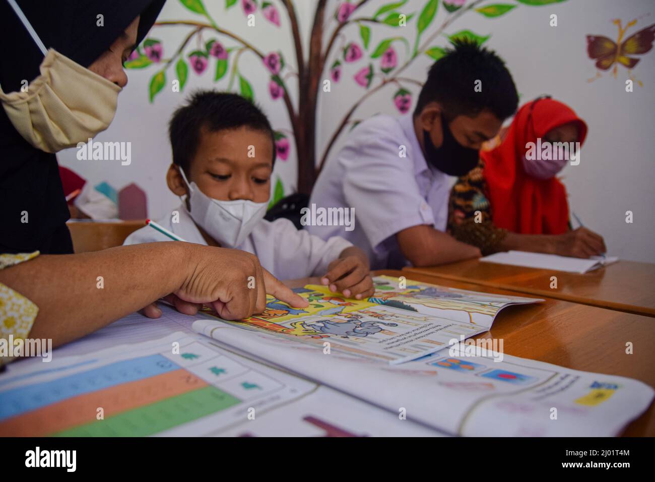 Soppeng, South Sulawesi, Indonesia. 14th Mar, 2022. A student with a ...