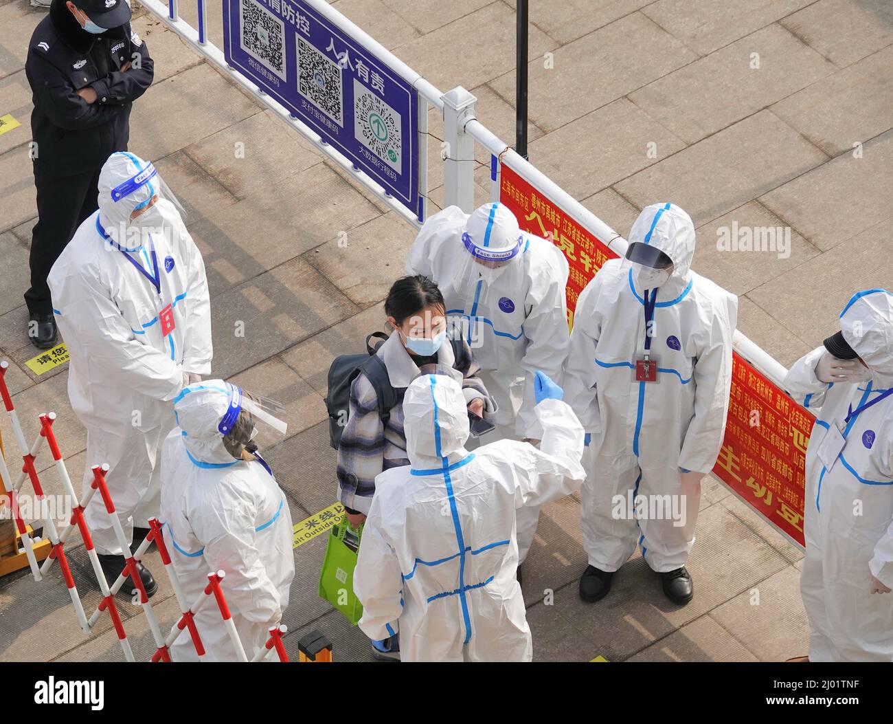 YANTAI, CHINA - MARCH 16, 2022 - Outbound passengers pass through an ...